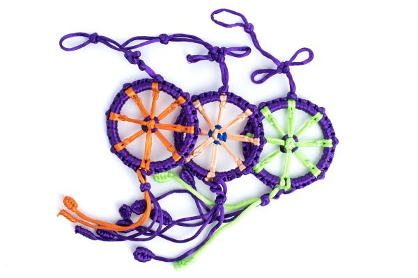 Dharma Wheel Charms - Tibetan Nuns Project
