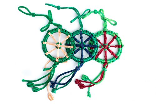Dharma Wheel Charms - Tibetan Nuns Project