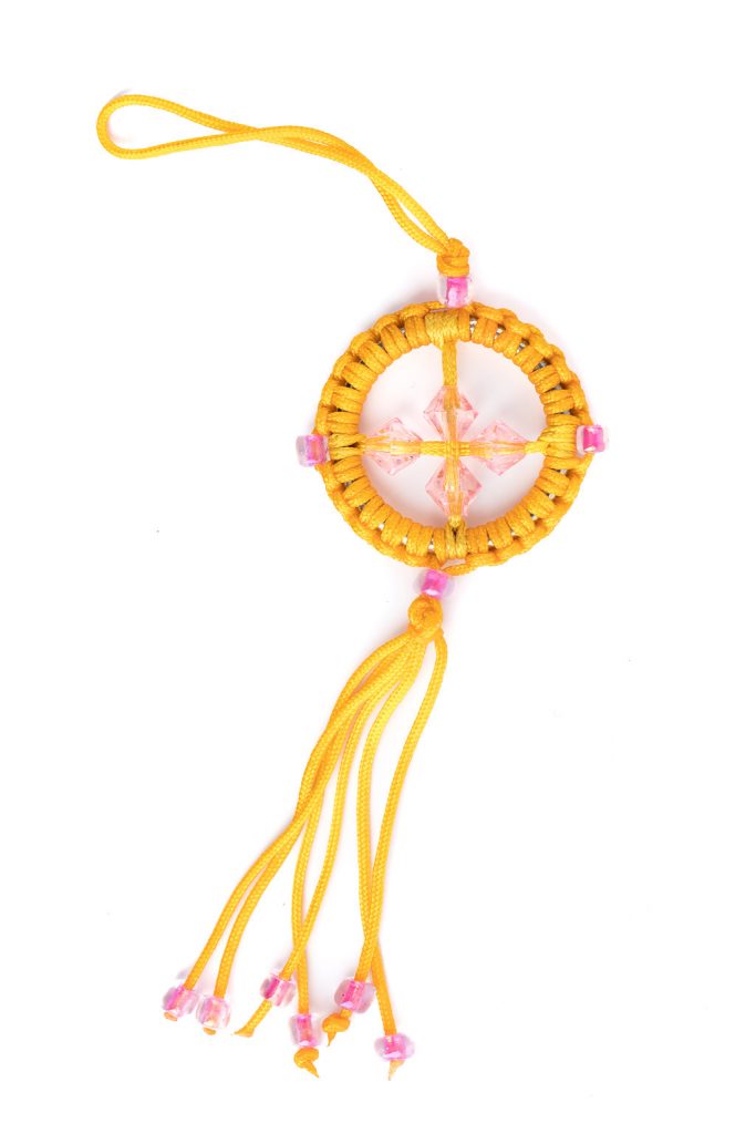 Dharma Wheel Charms - Tibetan Nuns Project